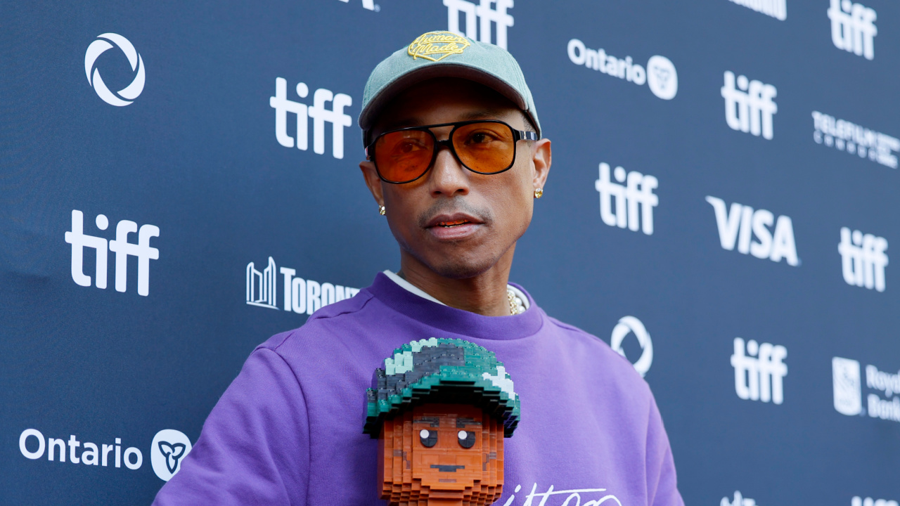 Pharrell Confronted By PETA Activist At LEGO Movie Premiere: 'Stop ...